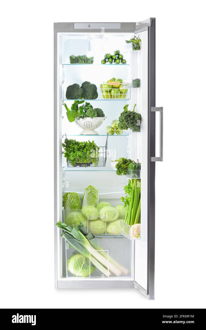 Fresh vegetables in open fridge on white background Stock Photo - Alamy