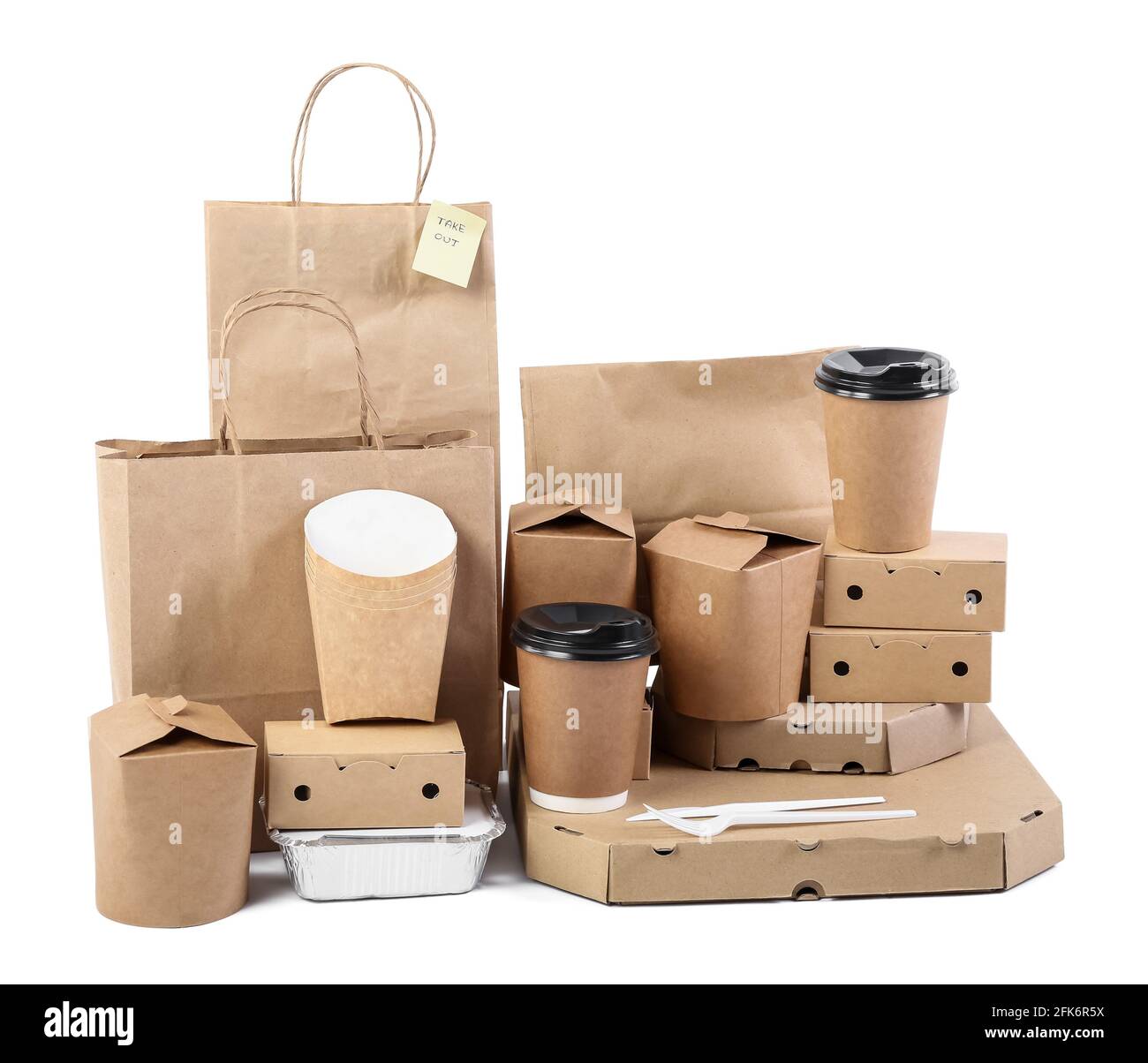Paper bags with sticker TAKE OUT, boxes for food and cups on white ...