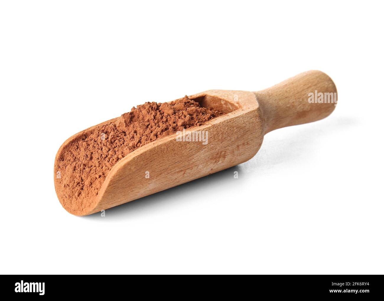 Scoop with cocoa powder on white background Stock Photo - Alamy