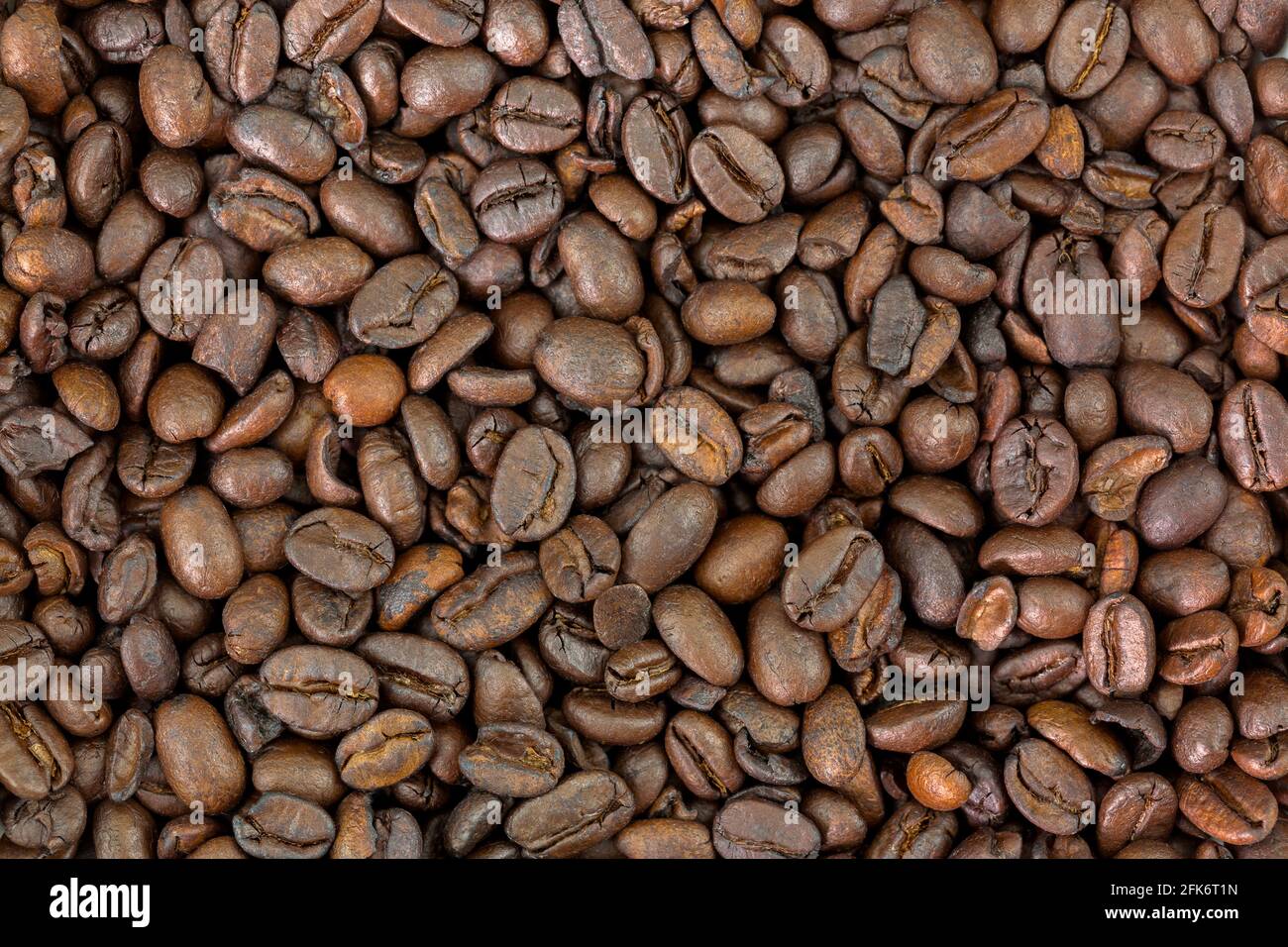 Closeup texture of very dark brown roasted Robusta coffee beans Stock ...