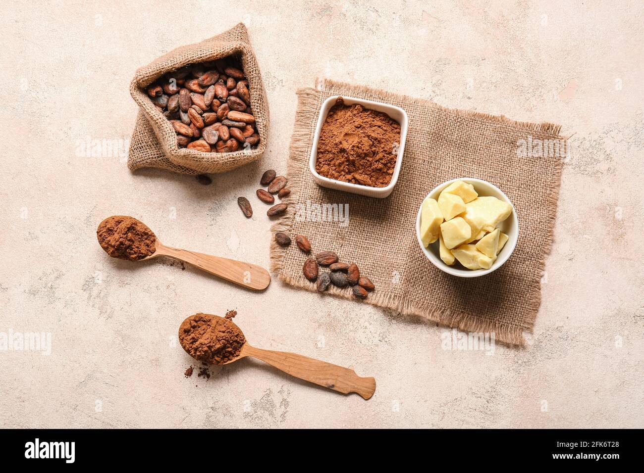 Composition with cocoa powder on light background Stock Photo - Alamy