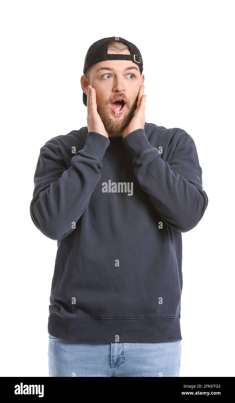 Shocked handsome man on white background Stock Photo - Alamy