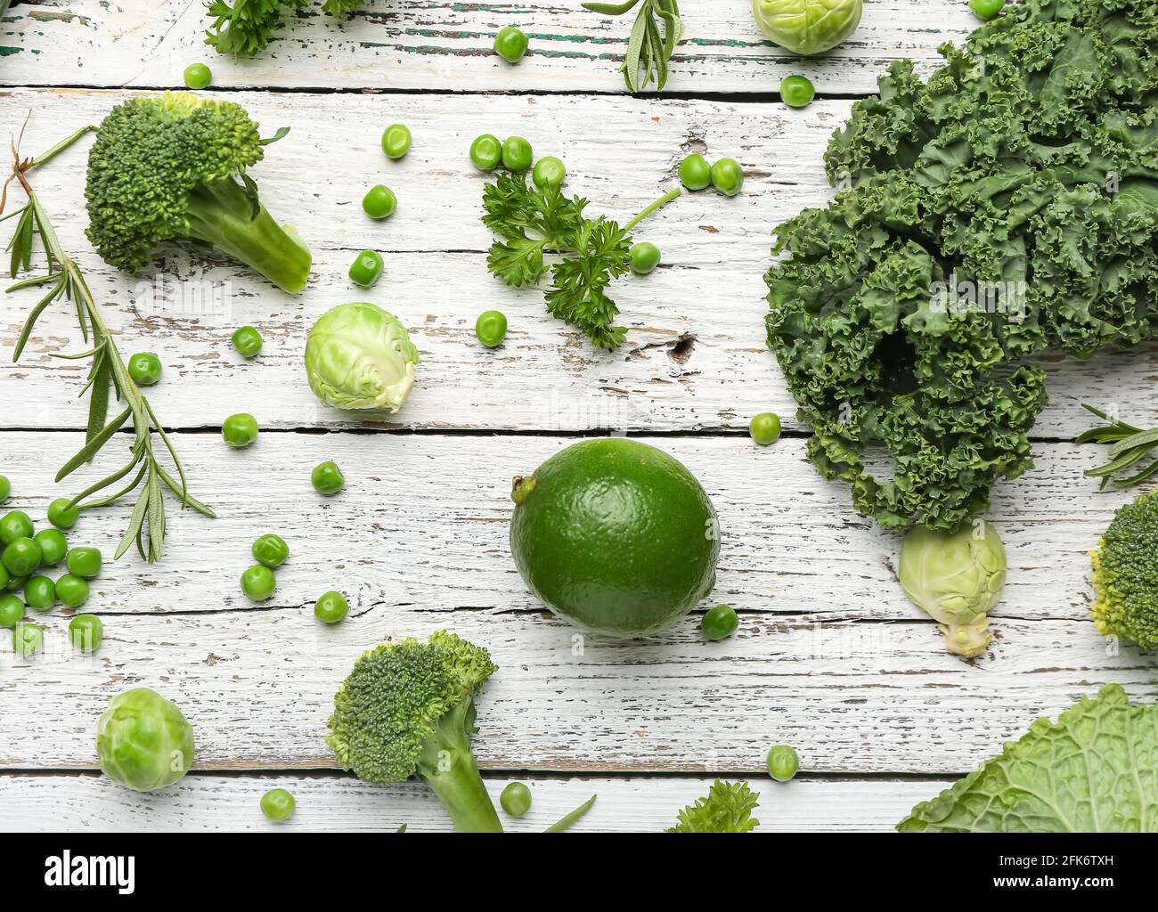 Fresh vegetables on white wooden background Stock Photo - Alamy