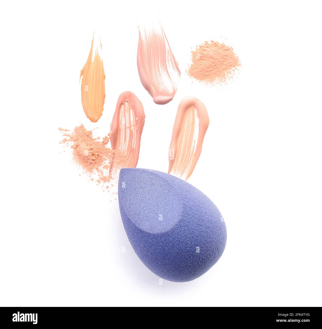 Makeup applying foundation sponge Cut Out Stock Images & Pictures - Alamy