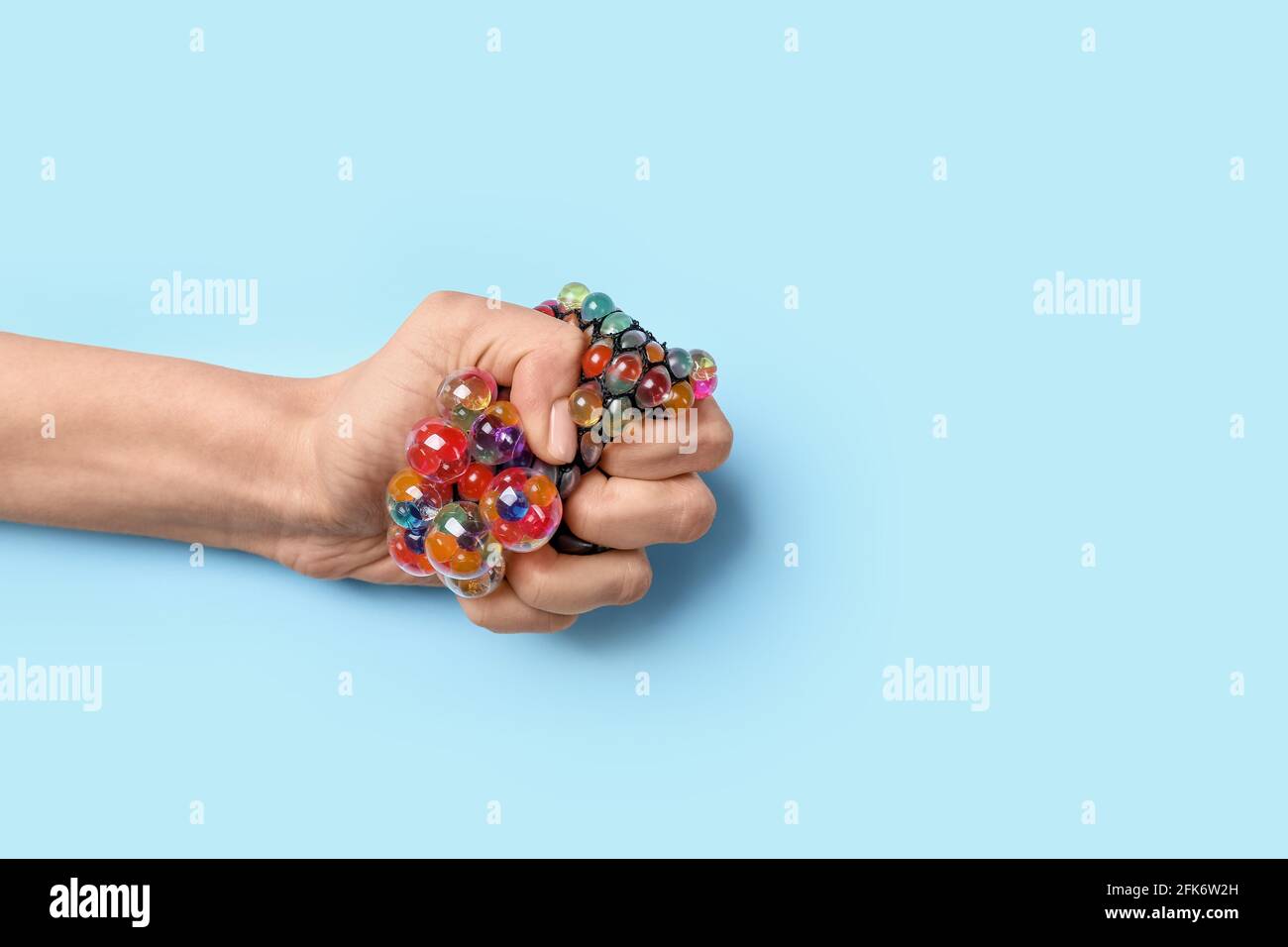 Female hand squeezing stress ball hi-res stock photography and images ...