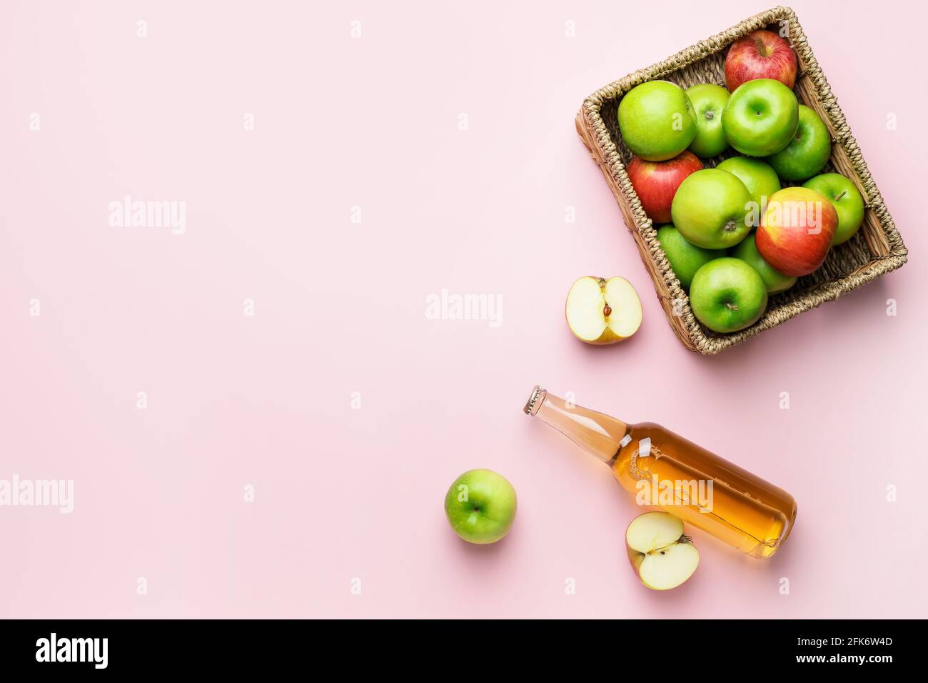 Composition with bottle of apple cider on color background Stock Photo ...