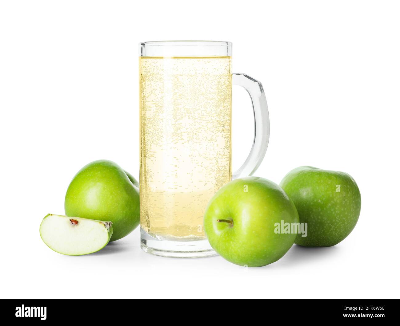 Mug of apple cider on white background Stock Photo - Alamy