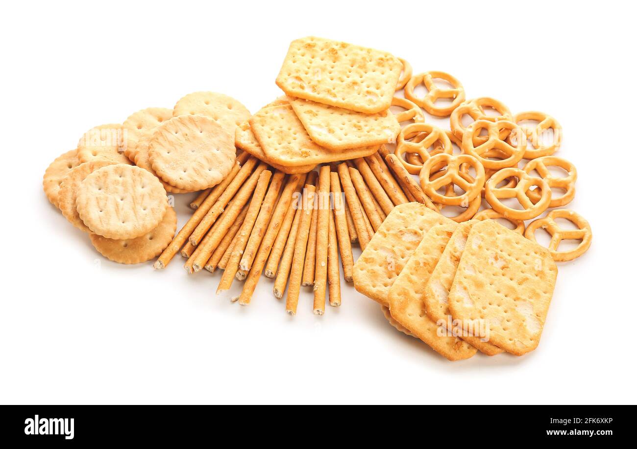 Tasty different crackers on white background Stock Photo - Alamy