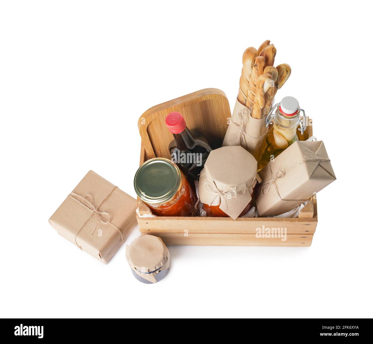Gift basket with products on white background Stock Photo - Alamy