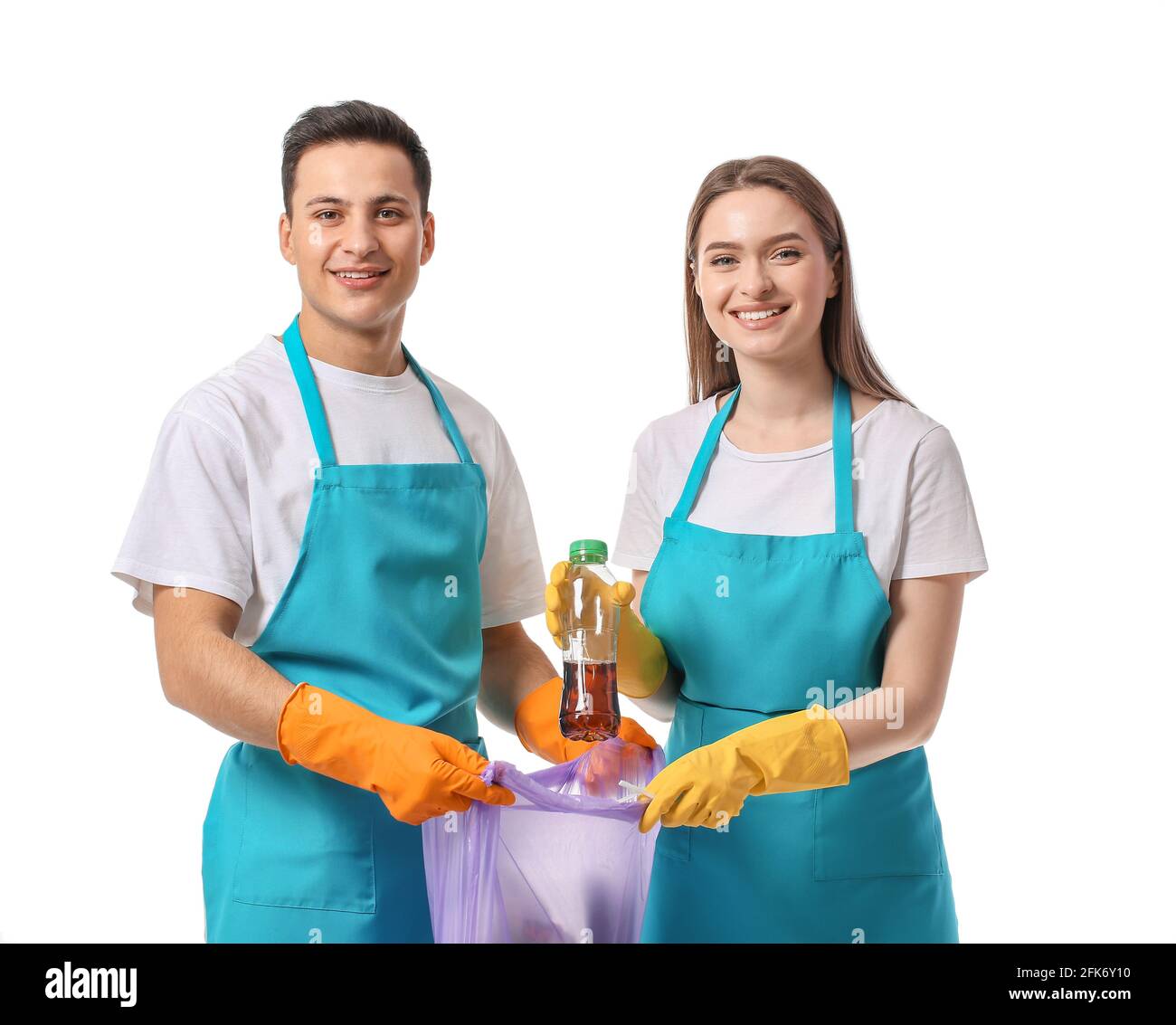 Male janitors with garbage on white background Stock Photo - Alamy