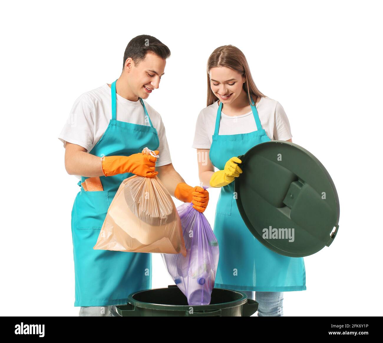 Janitors putting garbage in trash bin on white background Stock Photo ...