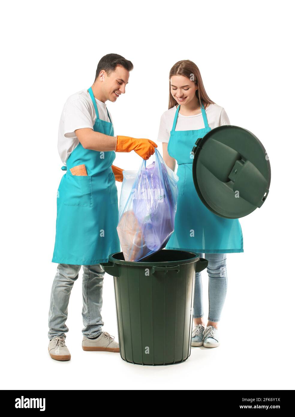 Janitors putting garbage in trash bin on white background Stock Photo ...