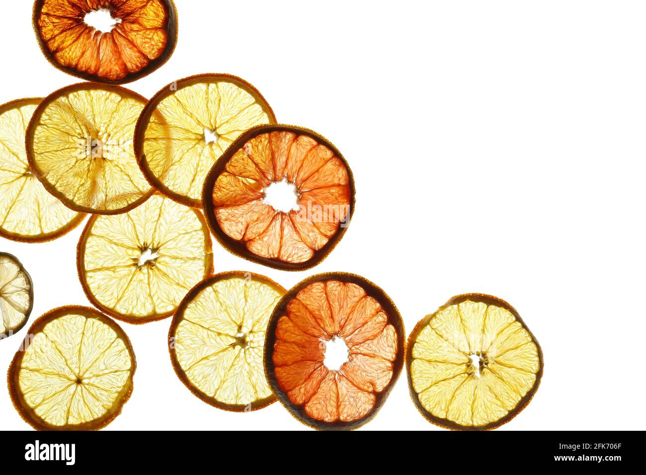 Dried citrus fruits on white background Stock Photo - Alamy
