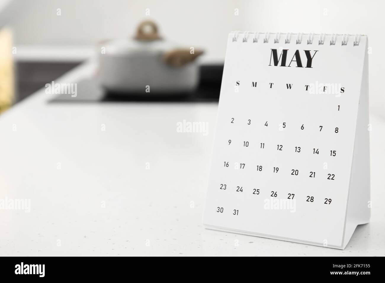 Flip paper calendar on table in kitchen Stock Photo - Alamy