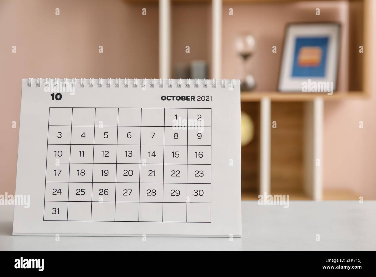 Flip paper calendar on table in office Stock Photo - Alamy