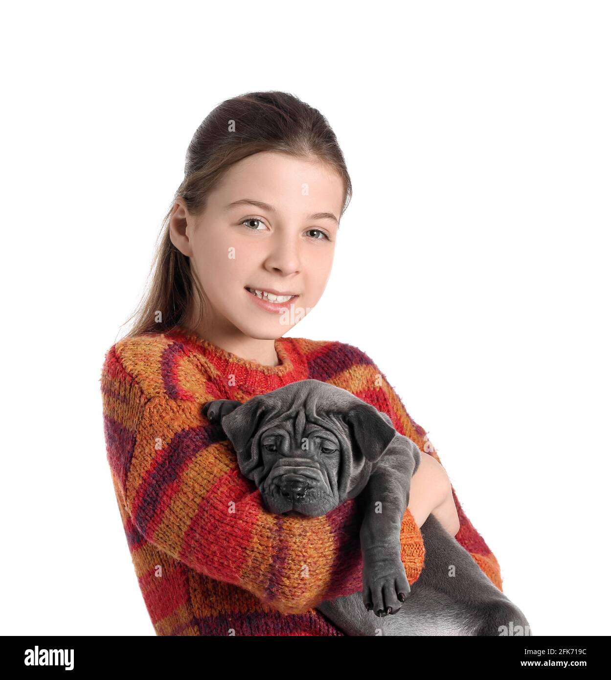 Cute girl with puppy on white background Stock Photo - Alamy