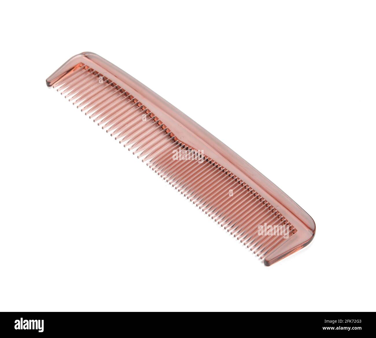 Plastic hair comb on white background Stock Photo - Alamy