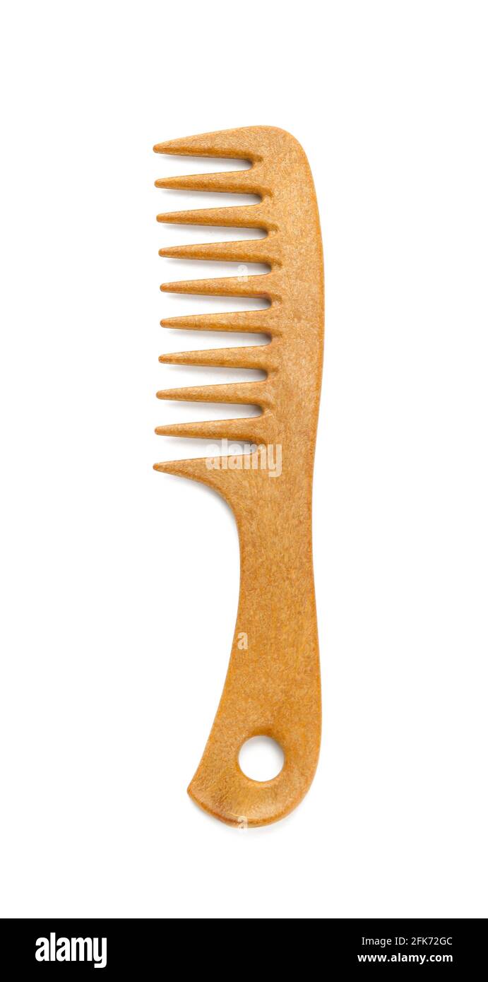 Wooden hair comb on white background Stock Photo - Alamy