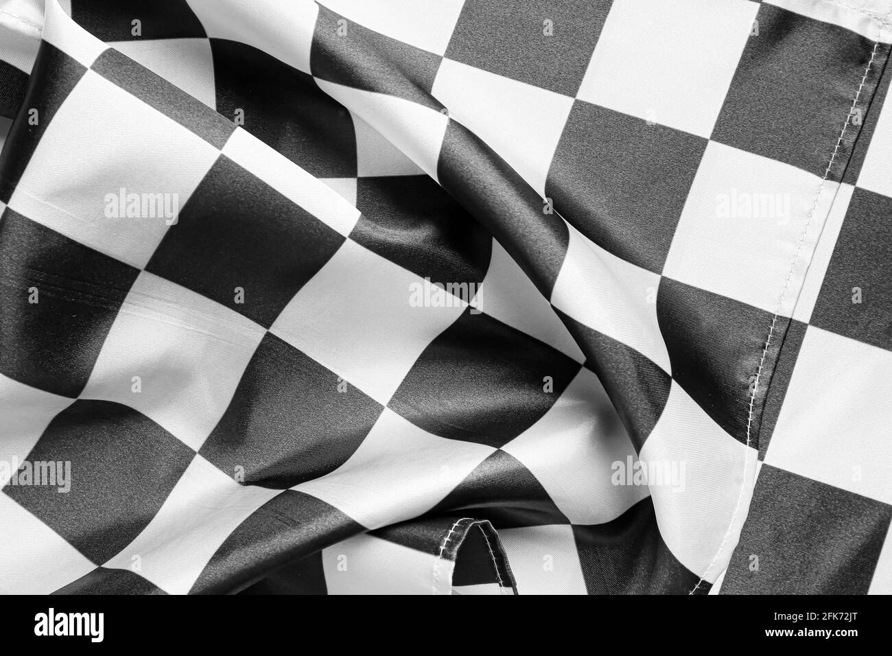 Racing flag as background, closeup Stock Photo - Alamy
