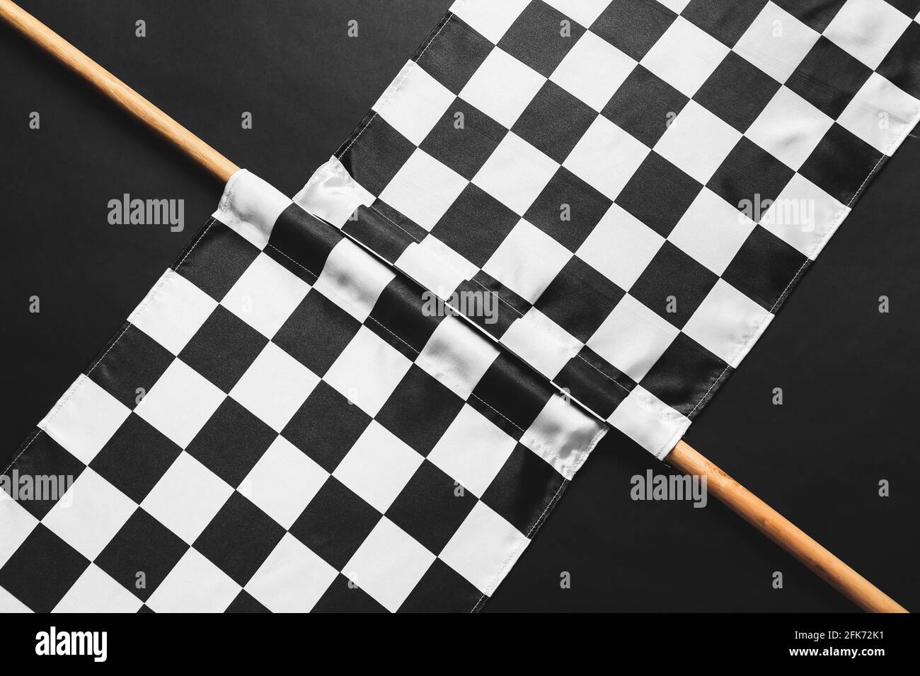 Racing flags on dark background Stock Photo - Alamy