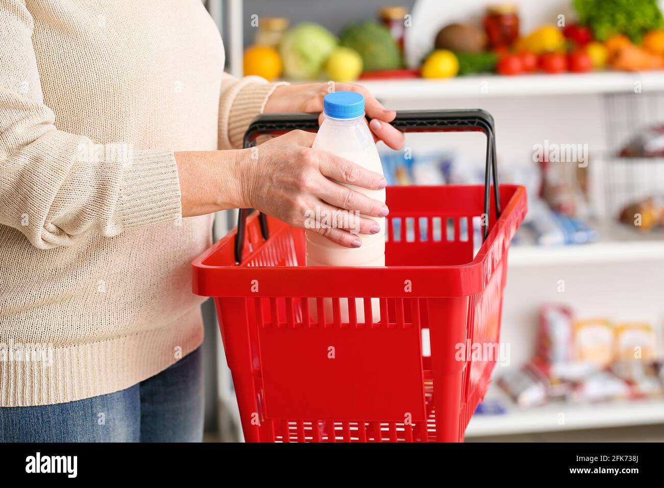 Buying milk hi-res stock photography and images - Alamy