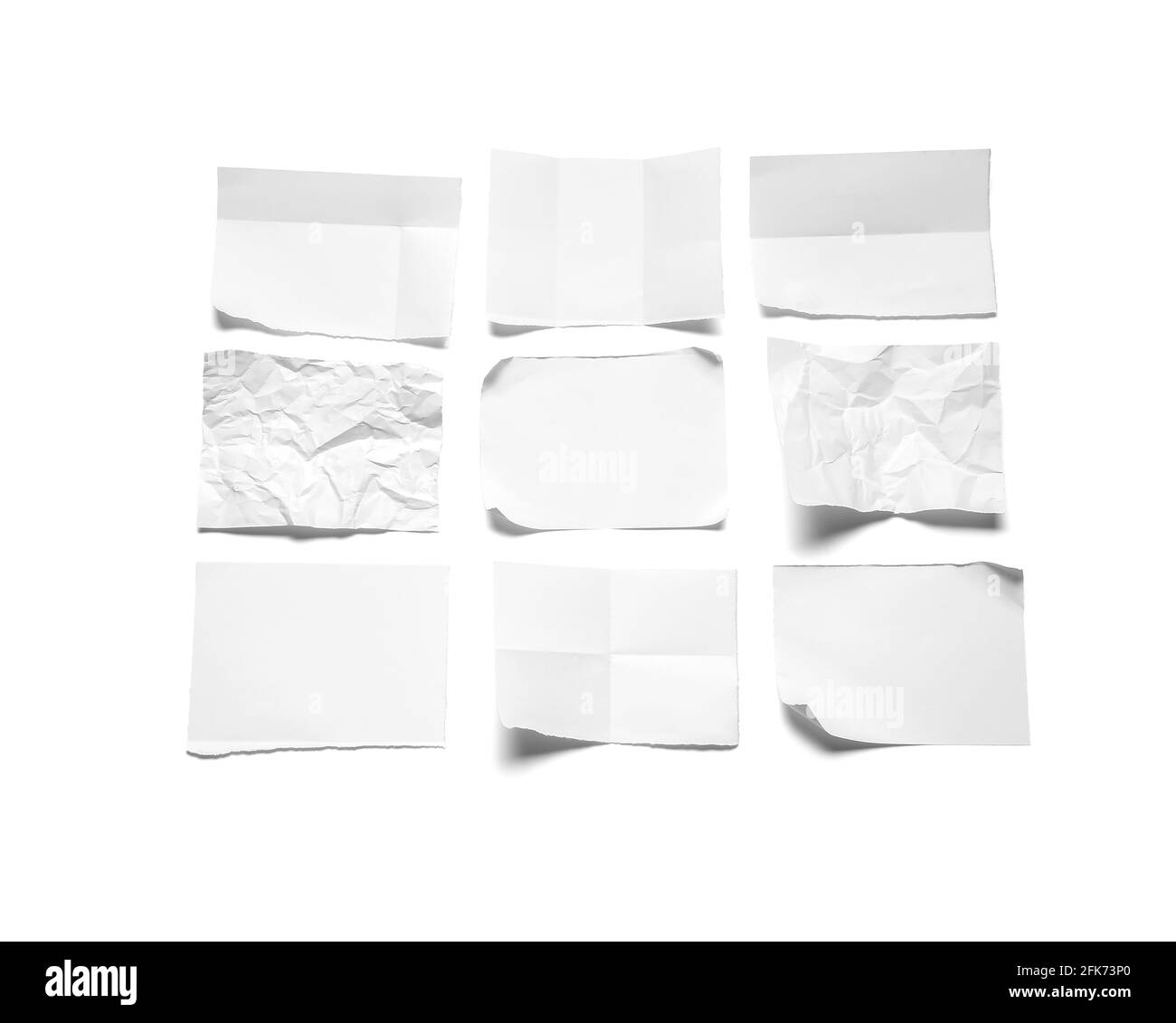 Blank sheets of paper on light background Stock Photo - Alamy