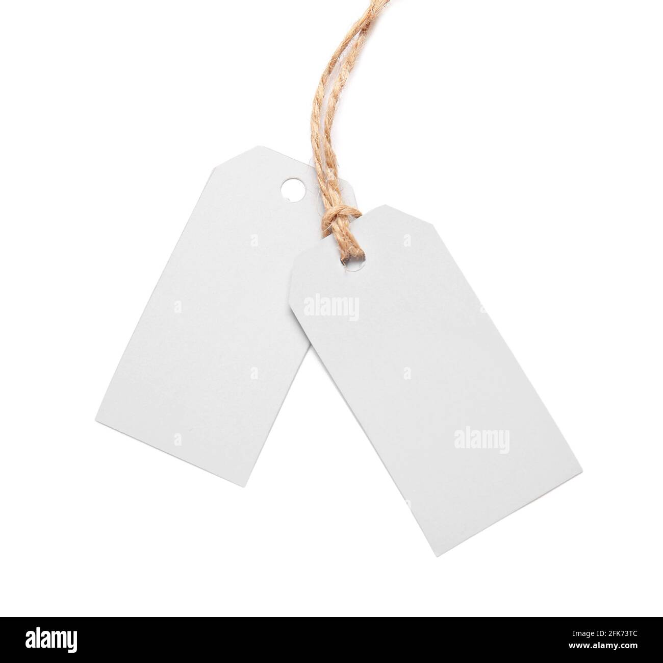 Blank shopping tags on white background Stock Photo - Alamy