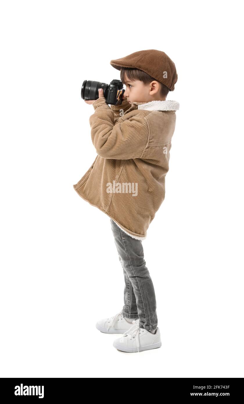 Cute little photographer on white background Stock Photo - Alamy