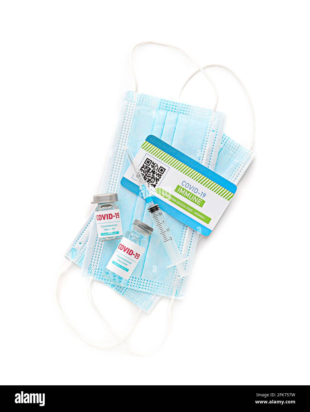 Immune card, covid-19 vaccine and medical masks on white background ...