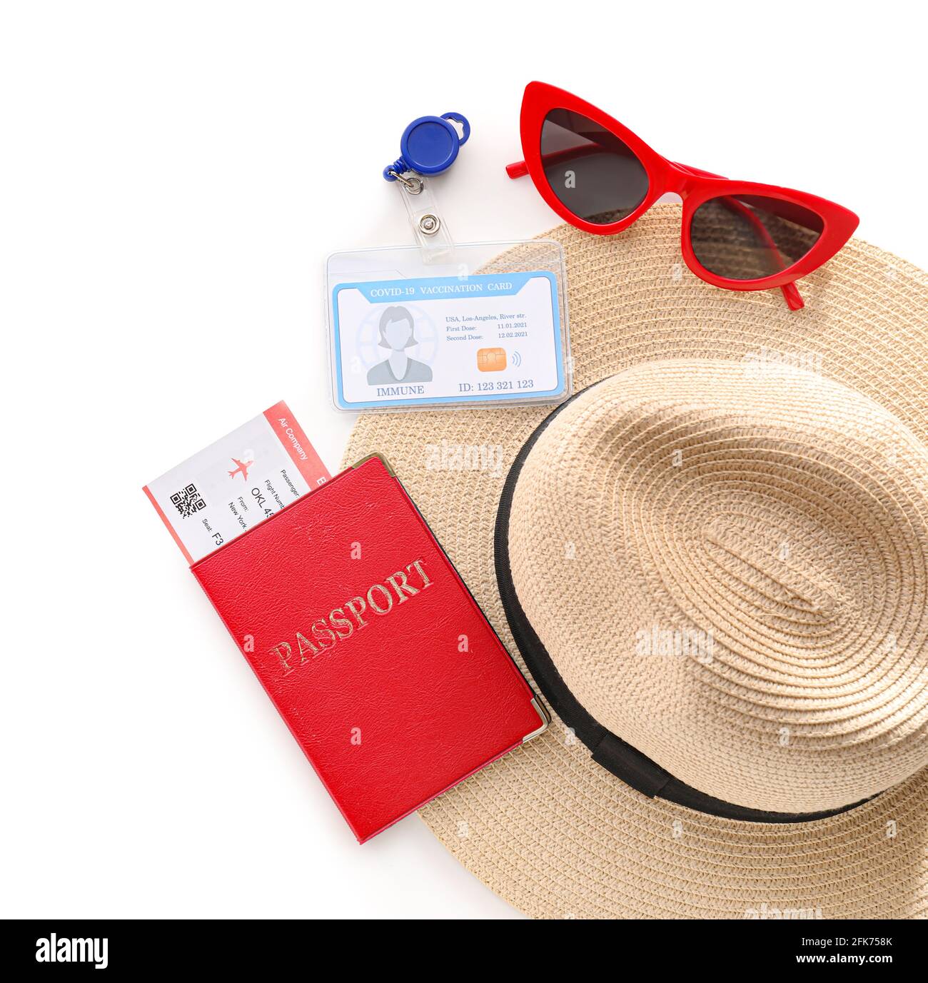 Travel supplies and immune card on white background Stock Photo - Alamy