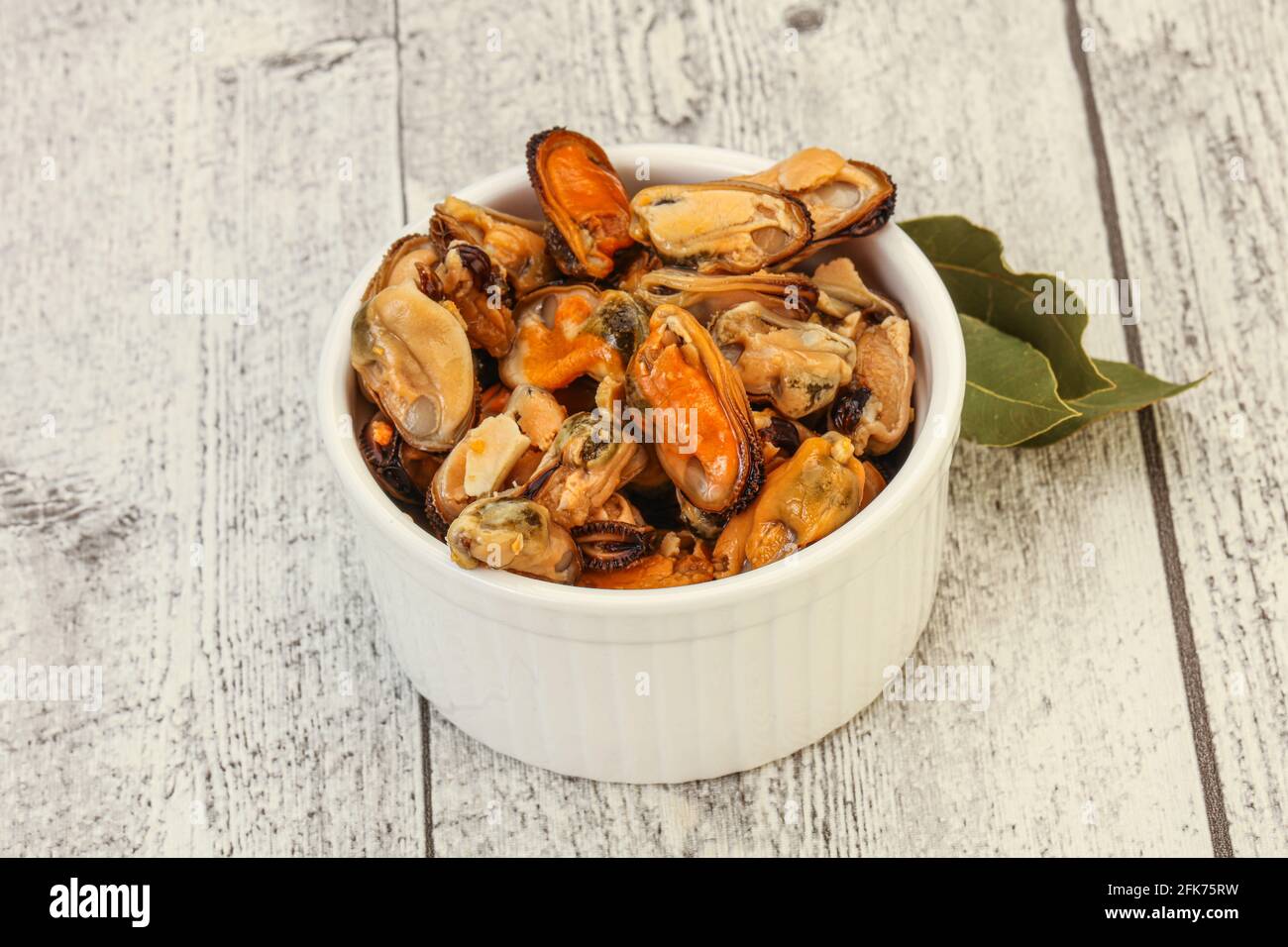 Pickled mussels with spices in the bowl Stock Photo - Alamy