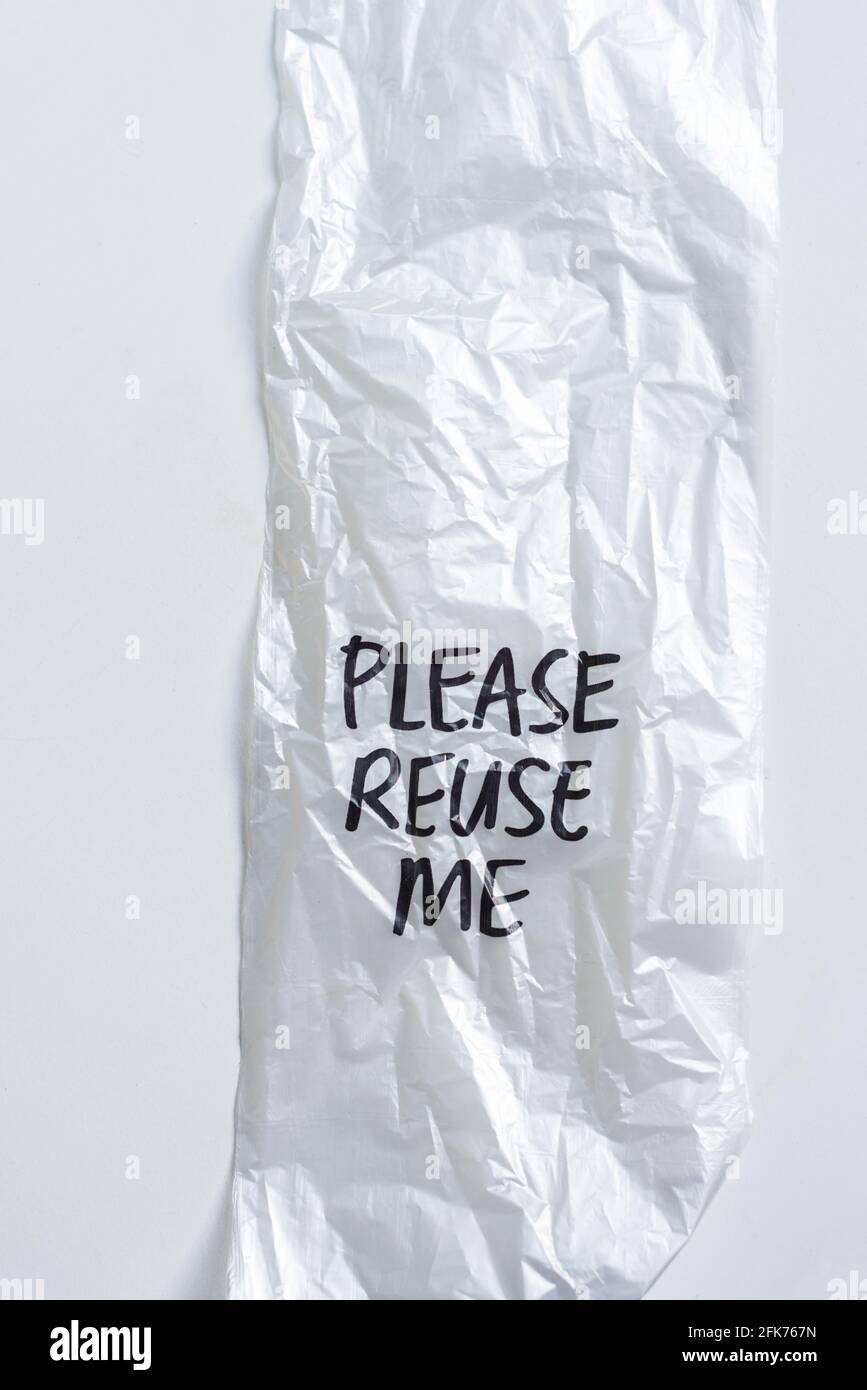 please reuse me plastic bag Stock Photo - Alamy