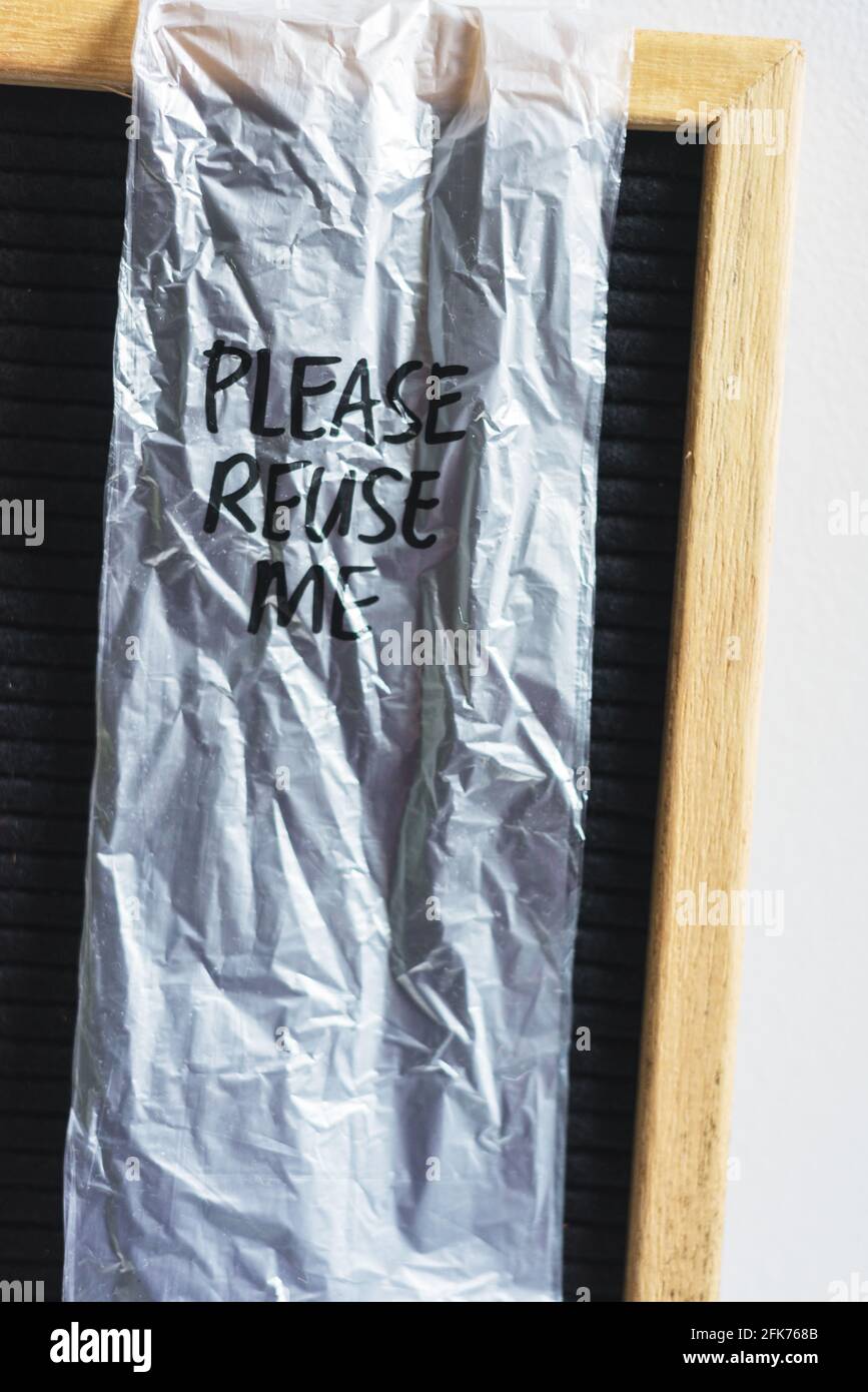 please reuse me plastic bag Stock Photo - Alamy