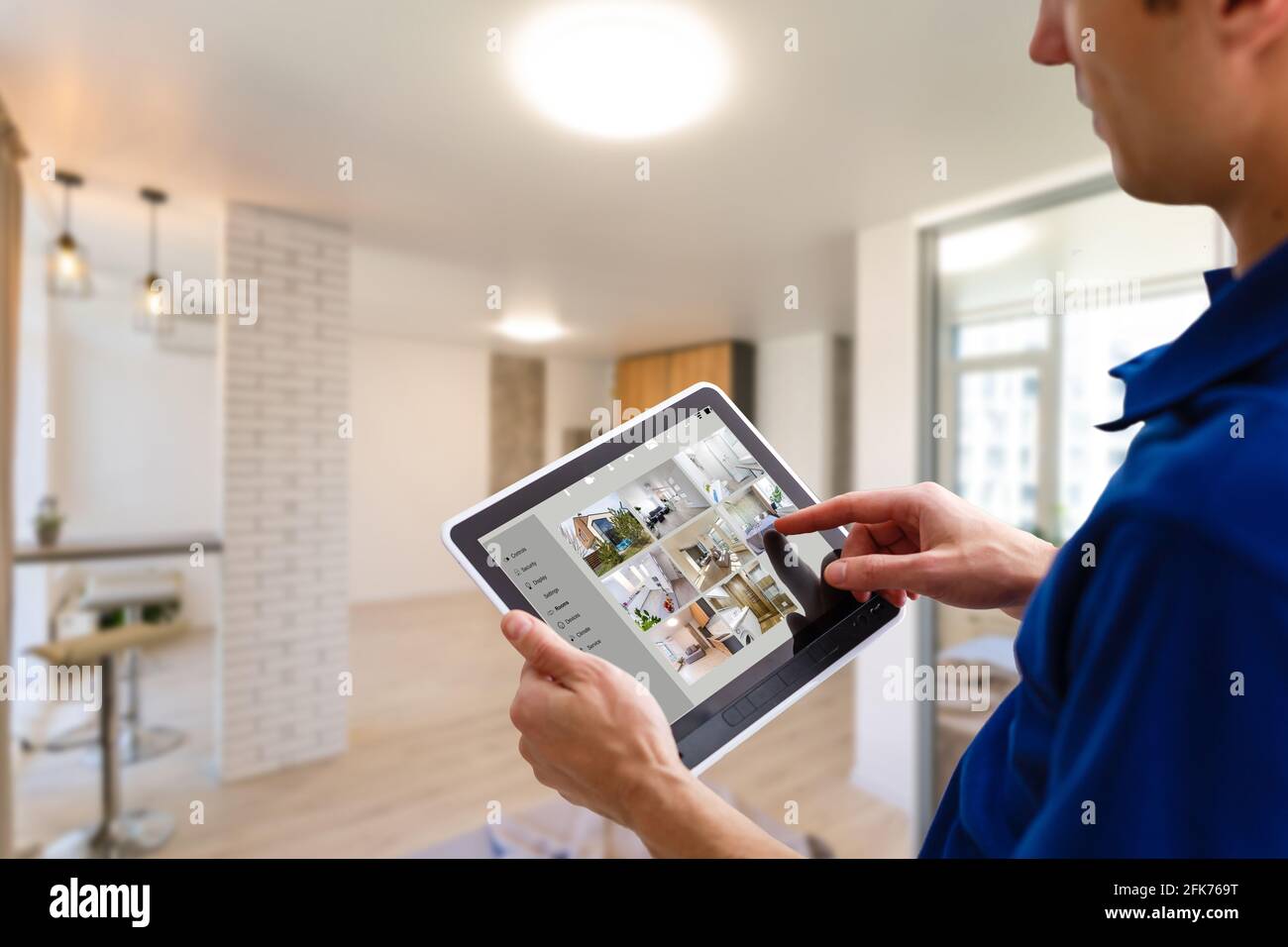 man having Home automation control station in a modern home 3D render ...