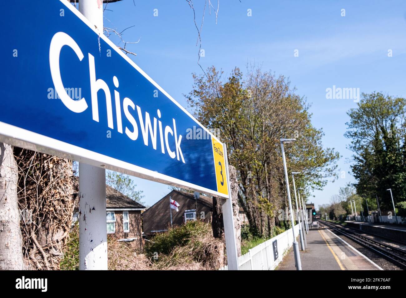 London- April, 2021: Chiswick Station sign on platform, a railway ...
