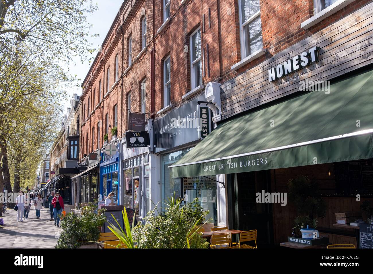 Chiswick High Road, a long high street of shops and restaurants in West ...