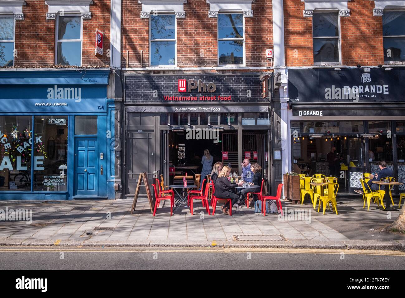 Chiswick High Road, a long high street of shops and restaurants in West ...