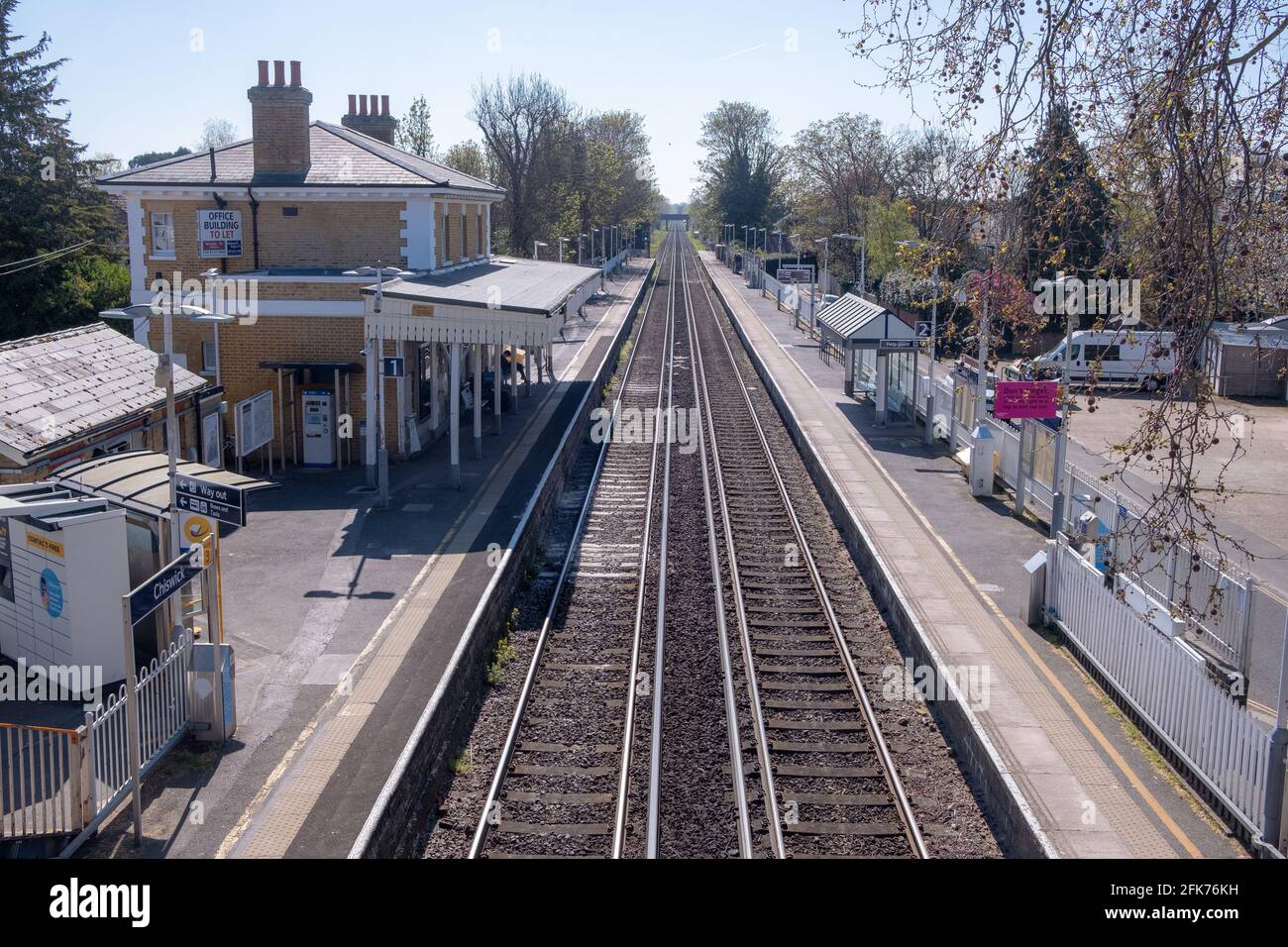 London- April, 2021: Chiswick Station sign on platform, a railway ...