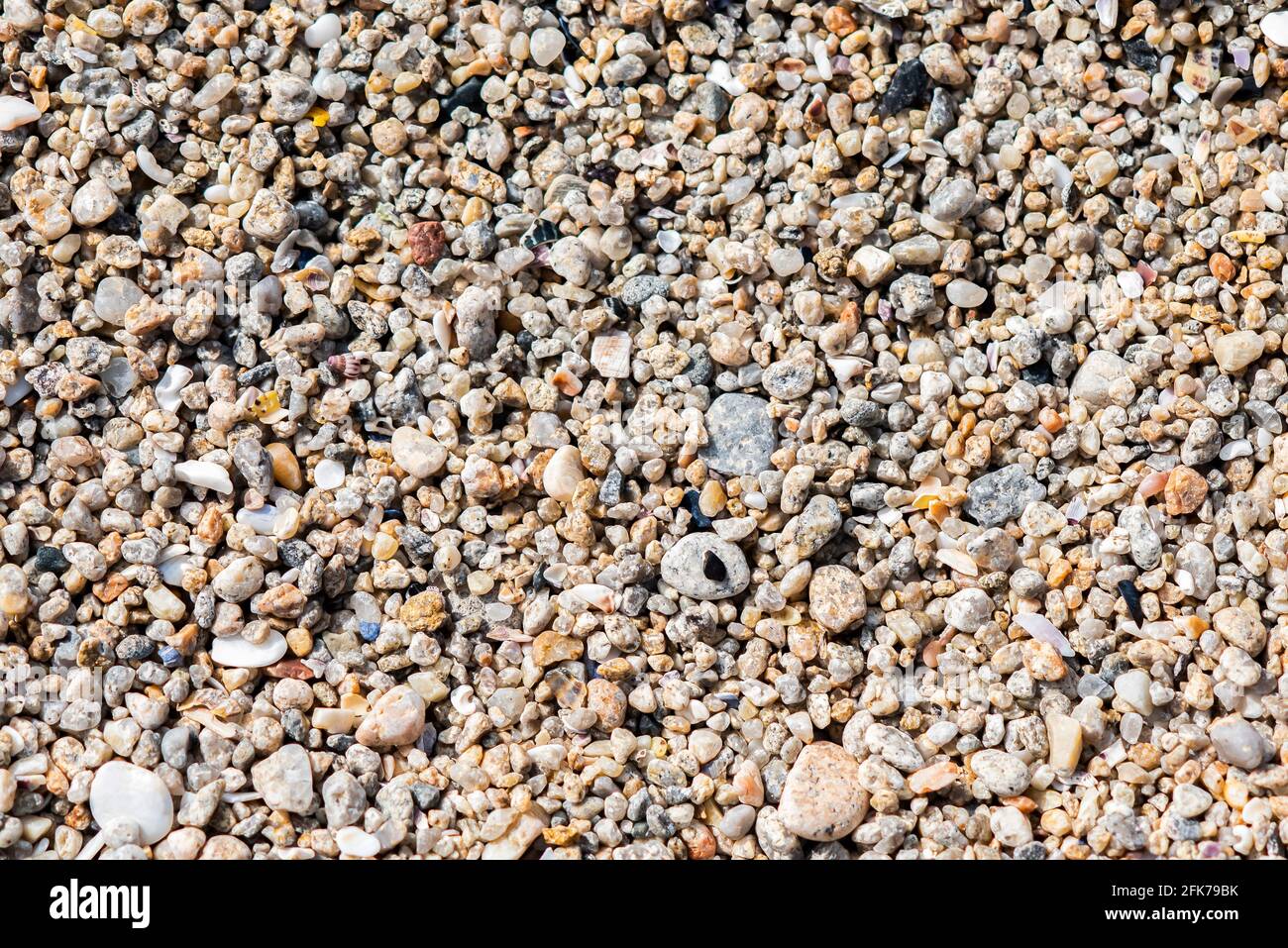 Texture of small pebbles in different colors and shapes Stock Photo - Alamy