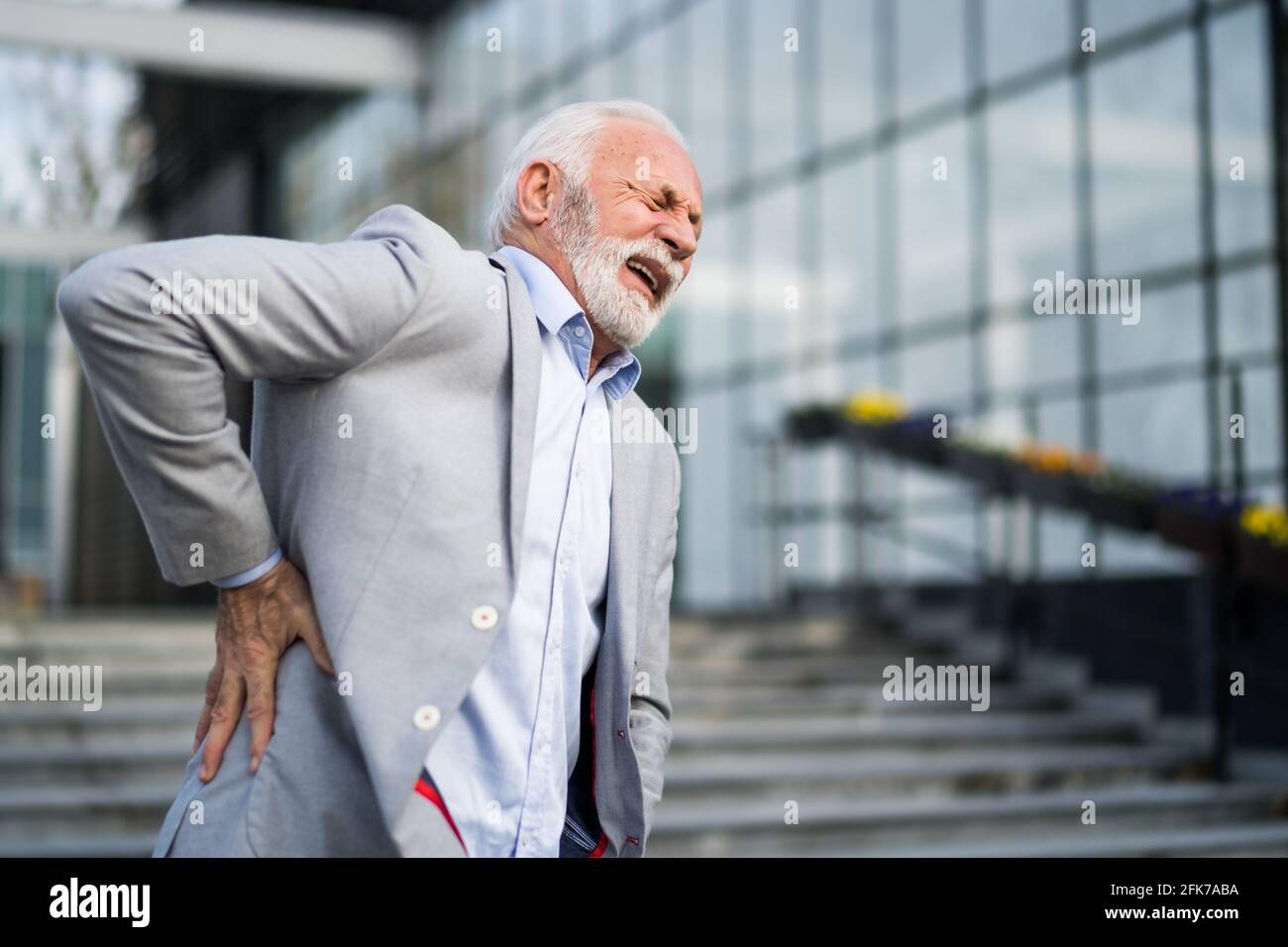 Senior businessman having sprain hi-res stock photography and images ...