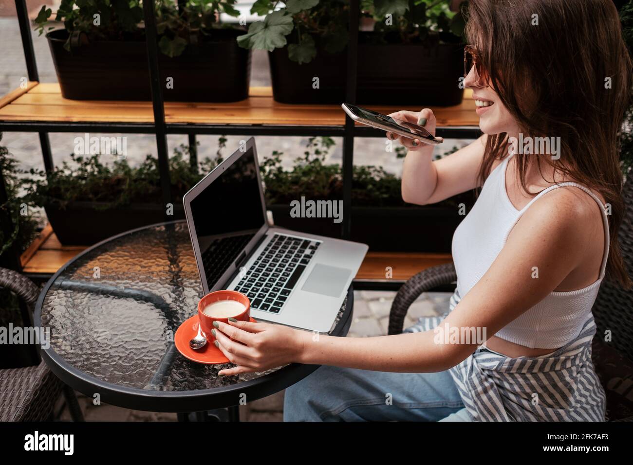 Young Brunette Woman Making Photo of Coffee on Smartphone While Sitting ...