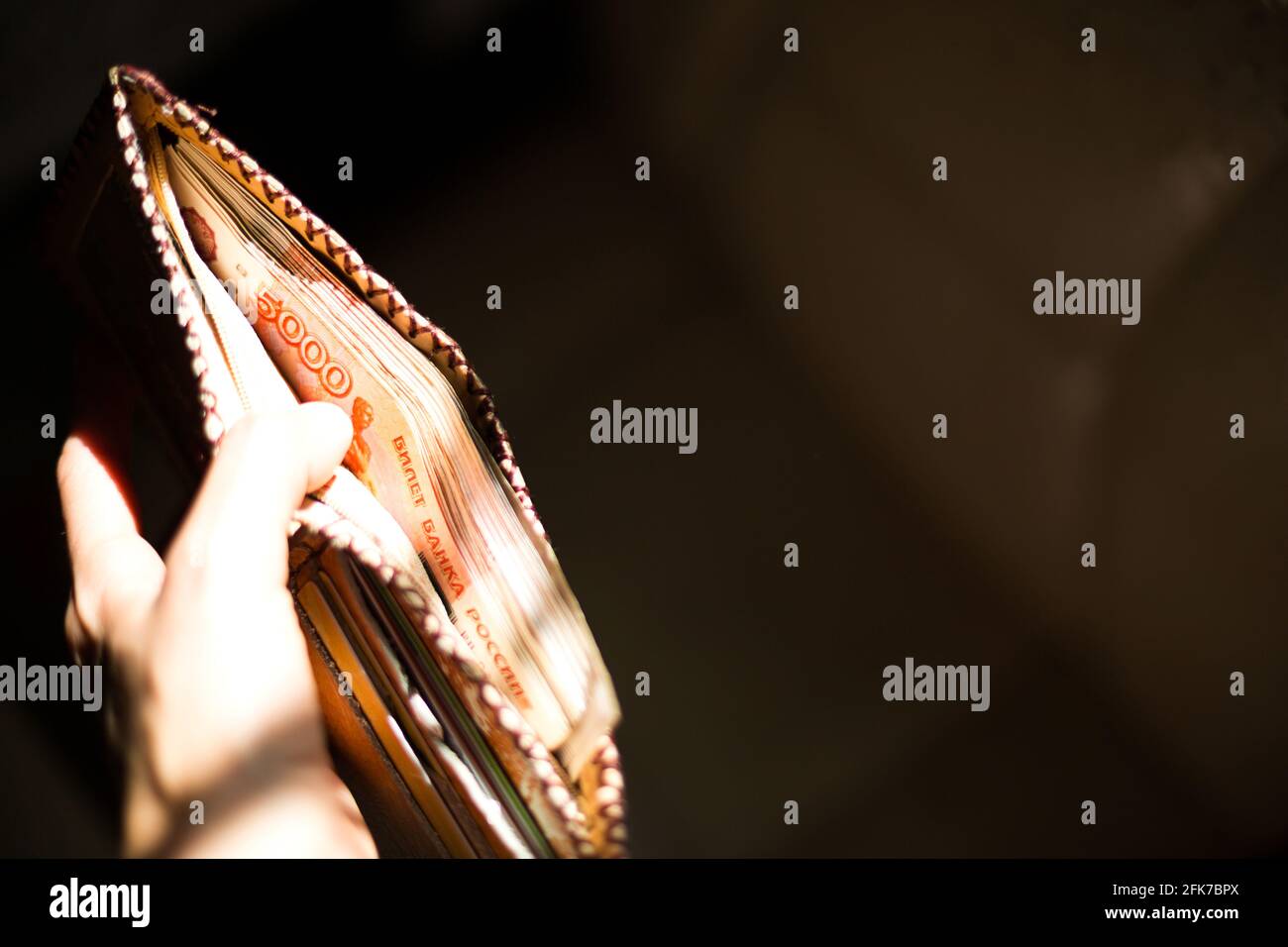 Leather wallet full of Russian money-5000 bills, five thousand rubles ...