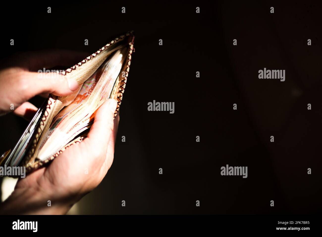 Leather wallet full of Russian money-5000 bills, five thousand rubles ...