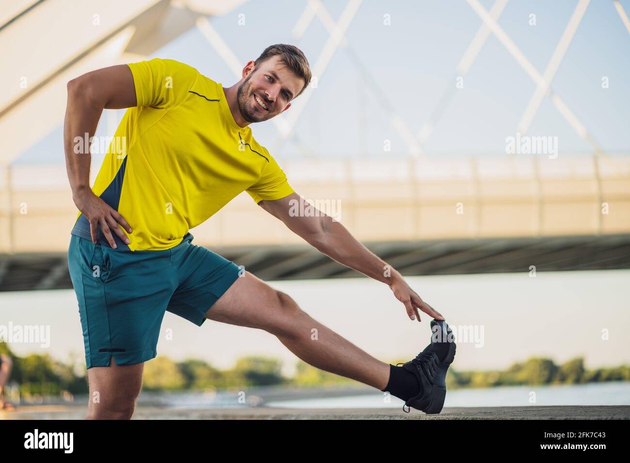 Man one leg up one arm up hi-res stock photography and images - Alamy