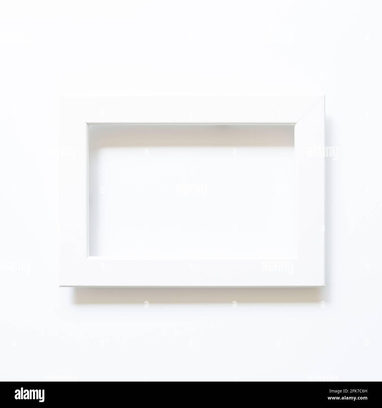 White picture frame on white background. top view, copy space Stock ...