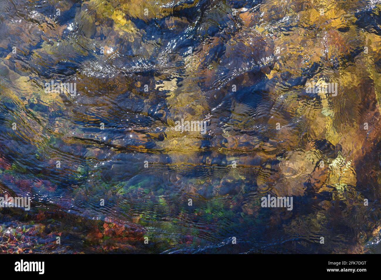 Calm flowing water in a small river is very clean and clear Stock Photo ...