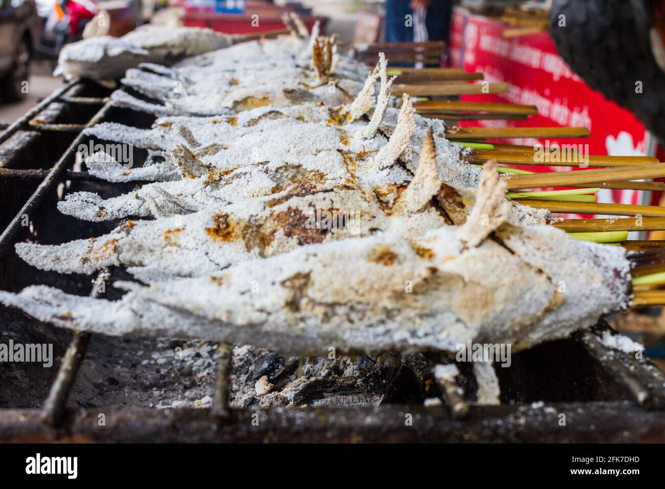 salted grill snakehead fish with herbs food Stock Photo - Alamy