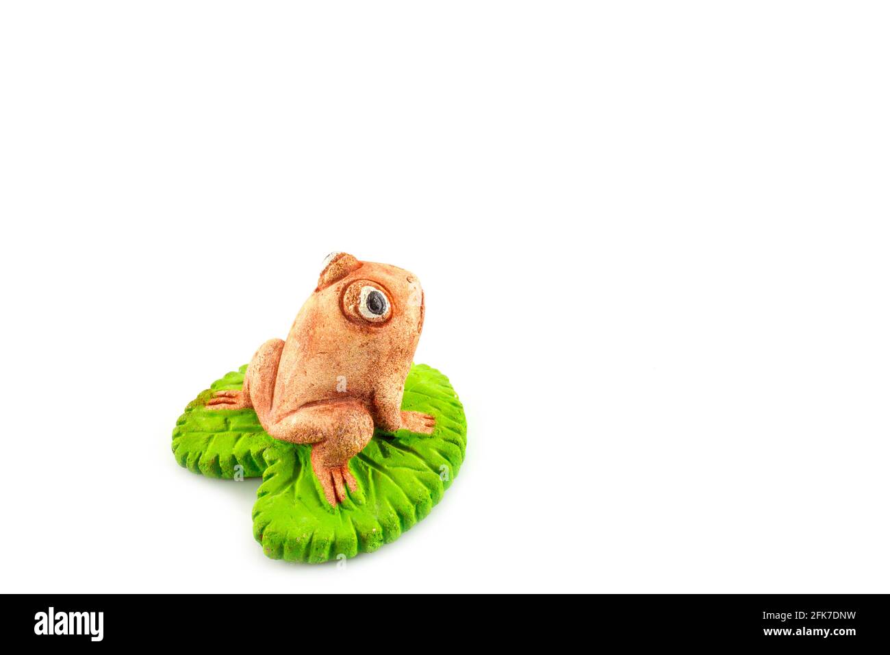 Green rubber plastic toy frogs hi-res stock photography and images - Alamy