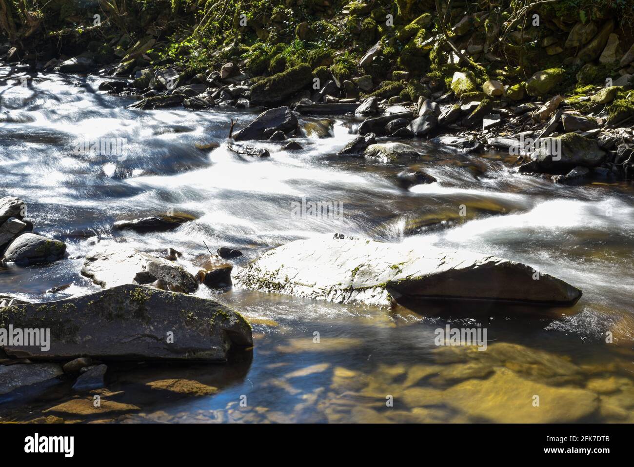 Water splashes over rocks hi-res stock photography and images - Alamy