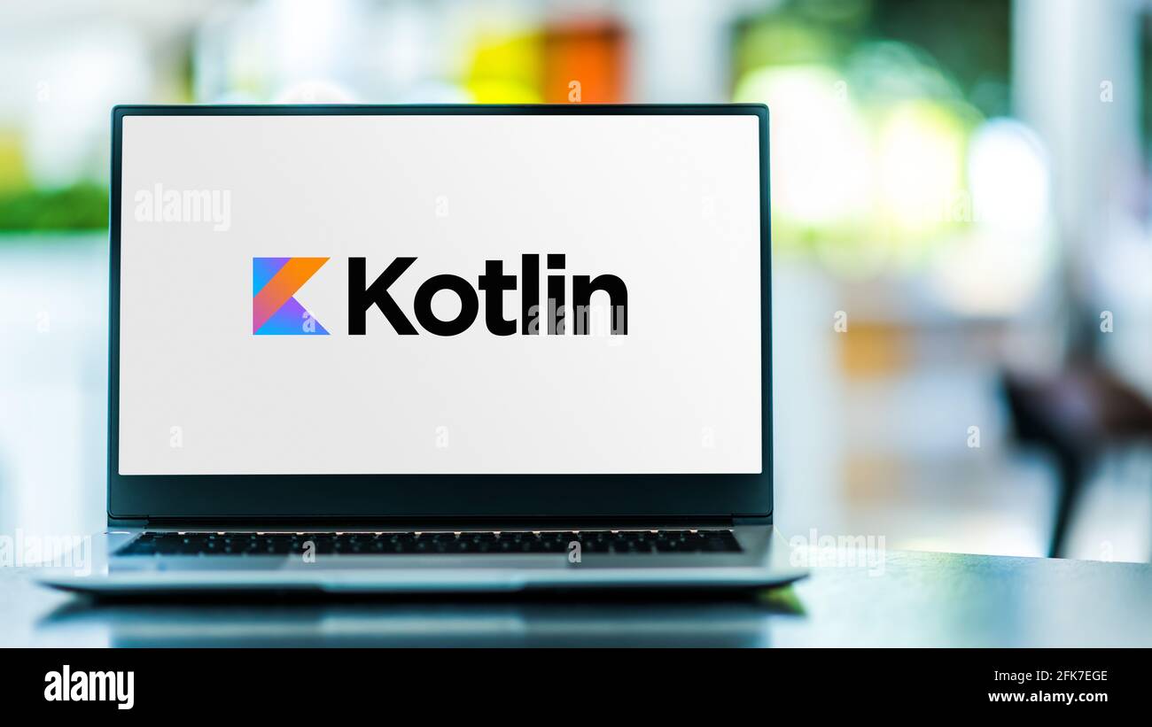 POZNAN, POL - APR 15, 2021: Laptop computer displaying logo of Kotlin ... POZNAN, POL - APR 15, 2021: Laptop computer displaying logo of Kotlin ...